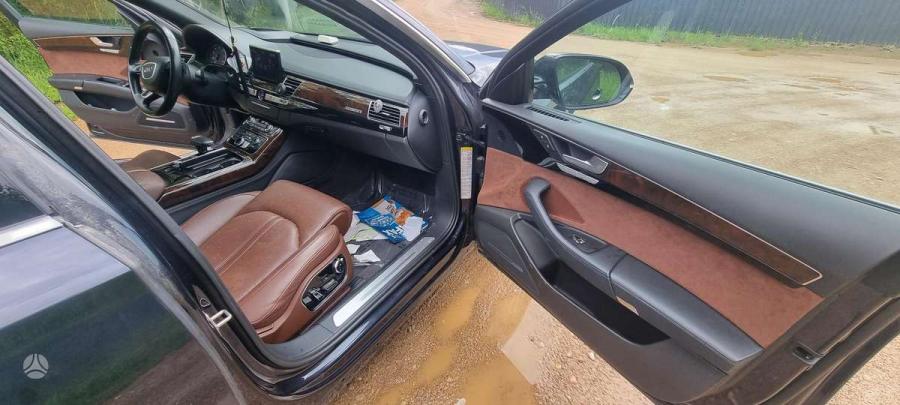 Blue Audi A8 2015 in Vilnius, with an engine capacity of 3.99 L and mileage of 142 thousand km for 10800 €, photo 19 on AUTOMOTO.COM.LV