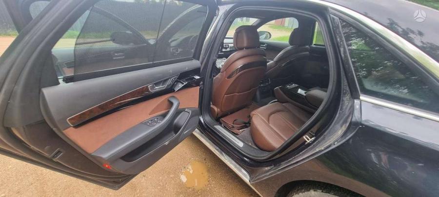 Blue Audi A8 2015 in Vilnius, with an engine capacity of 3.99 L and mileage of 142 thousand km for 10500 €, photo 16 on AUTOMOTO.COM.LV