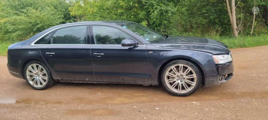 Blue Audi A8 2015 in Vilnius, with an engine capacity of 3.99 L and mileage of 142 thousand km for 10500 €, photo 7 on AUTOMOTO.COM.LV