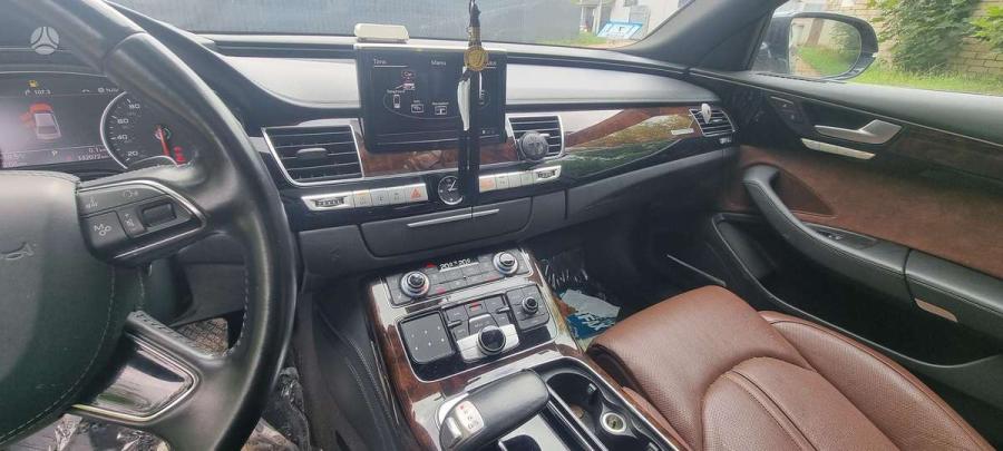 Blue Audi A8 2015 in Vilnius, with an engine capacity of 3.99 L and mileage of 142 thousand km for 10500 €, photo 15 on AUTOMOTO.COM.LV
