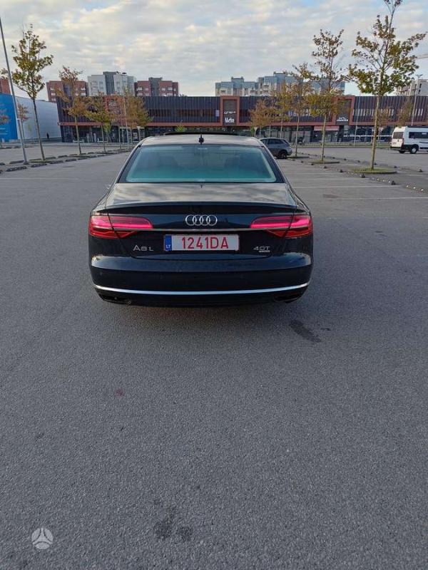 Blue Audi A8 2015 in Klaipeda, with an engine capacity of 3.99 L and mileage of 218 thousand km for 17500 €, photo 6 on AUTOMOTO.COM.LV