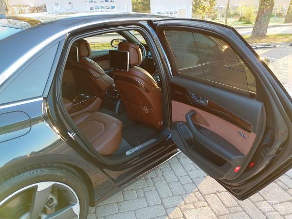 Blue Audi A8 2017 in Kelme, with an engine capacity of 3.00 L and mileage of 176 thousand km for 24000 €, photo 5 on AUTOMOTO.COM.LV