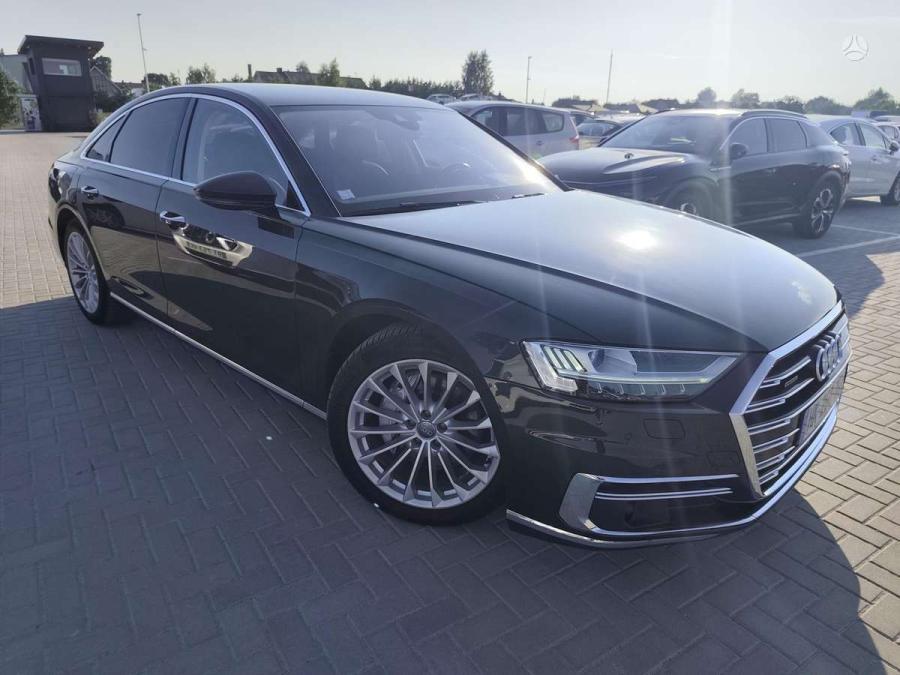 Blue Audi A8 2019 in Taurage, with an engine capacity of 2.97 L and mileage of 219 thousand km for 29900 €, photo 3 on AUTOMOTO.COM.LV