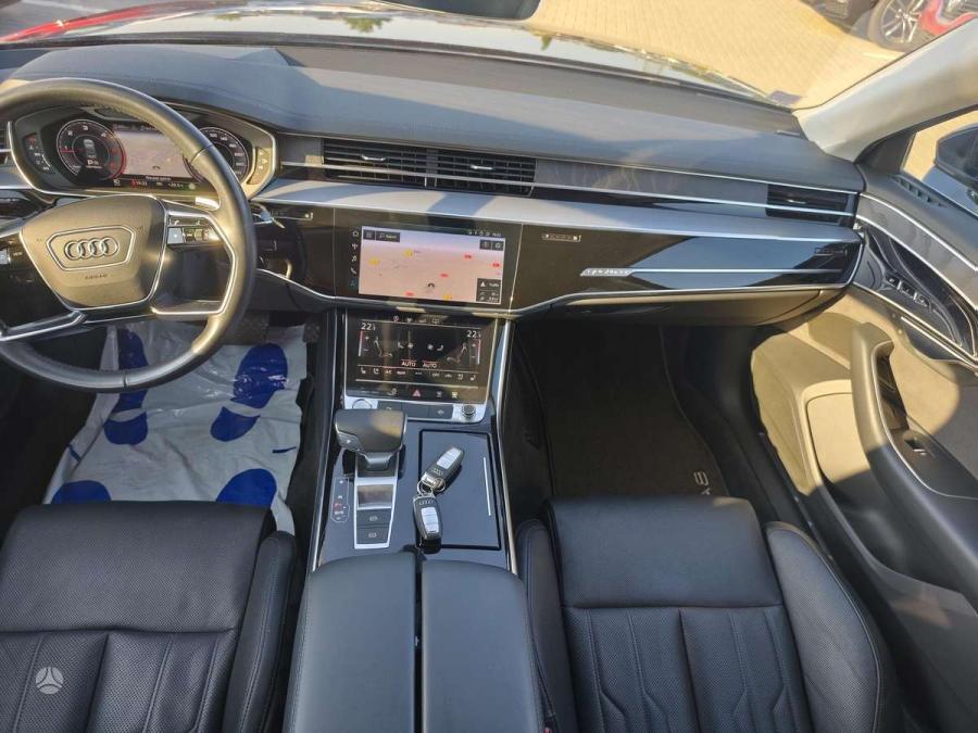 Blue Audi A8 2019 in Taurage, with an engine capacity of 2.97 L and mileage of 219 thousand km for 29900 €, photo 8 on AUTOMOTO.COM.LV