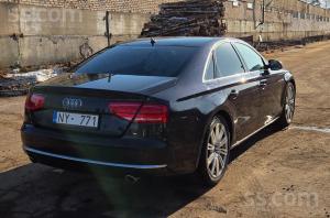 Brown Audi A8 2011 in Daugavpils, with an engine capacity of 3.00 L and mileage of 270 thousand km for 14500 €, photo 5 on AUTOMOTO.COM.LV