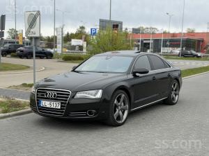 Brūns Audi A8 2012 Rīga, ar dzinēja tilpumu 4.20 L un nobraukumu 309 tūkst. km par 21000 €, foto  vietnē AUTOMOTO.COM.LV