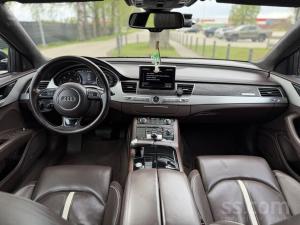 Brown Audi A8 2012 in Riga, with an engine capacity of 4.20 L and mileage of 309 thousand km for 21000 €, photo 9 on AUTOMOTO.COM.LV