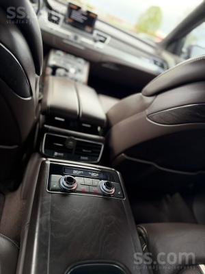 Brown Audi A8 2012 in Riga, with an engine capacity of 4.20 L and mileage of 309 thousand km for 21000 €, photo 13 on AUTOMOTO.COM.LV