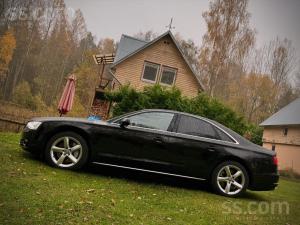 Brown Audi A8 2012 in Riga, with an engine capacity of 4.20 L and mileage of 309 thousand km for 21000 €, photo 25 on AUTOMOTO.COM.LV