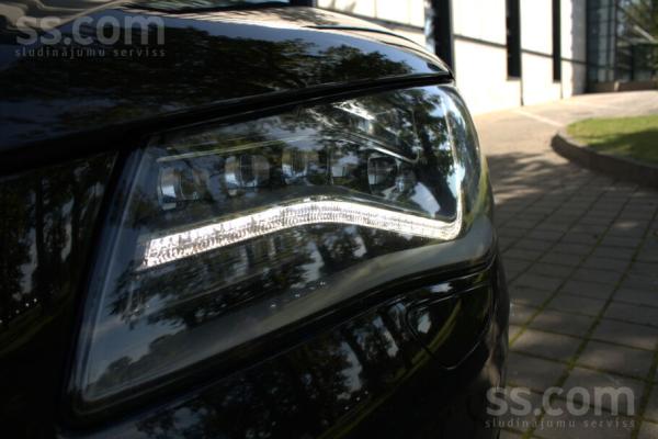 Brown Audi A8 2012 in Tukums, with an engine capacity of 3.00 L and mileage of 309 thousand km for 13990 €, photo 6 on AUTOMOTO.COM.LV