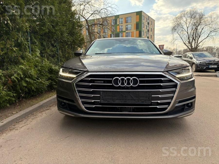 Brown Audi A8 2021 in Riga, with an engine capacity of 3.00 L and mileage of 180 thousand km for 37450 €, photo 1 on AUTOMOTO.COM.LV