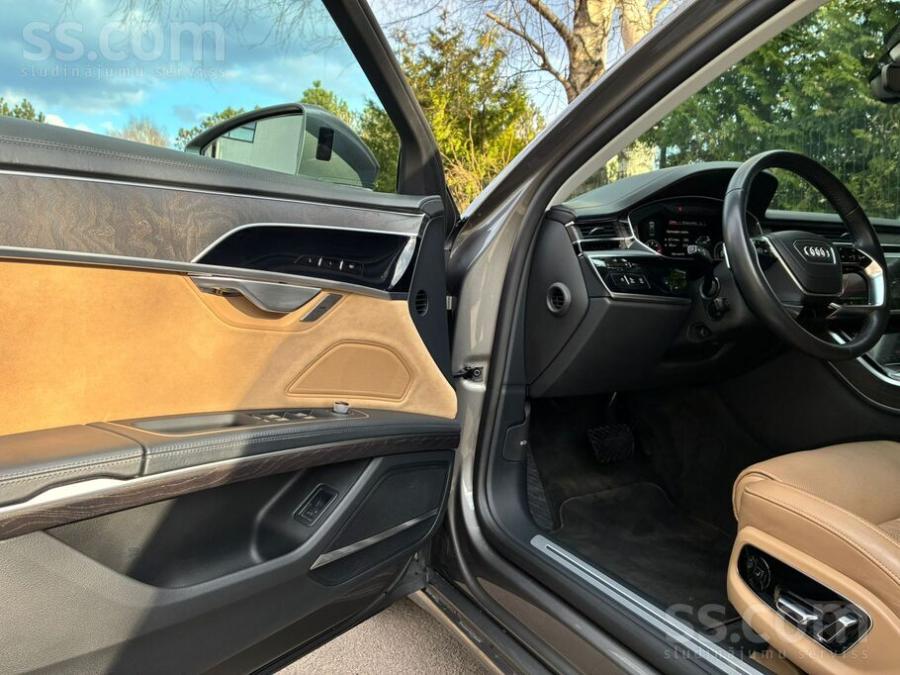 Brown Audi A8 2021 in Riga, with an engine capacity of 3.00 L and mileage of 180 thousand km for 37450 €, photo 10 on AUTOMOTO.COM.LV