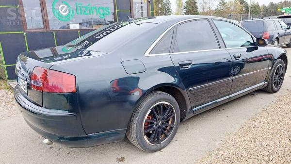 Green Audi A8 2006 in Riga, with an engine capacity of 3.00 L and mileage of 406 thousand km for 3590 €, photo 2 on AUTOMOTO.COM.LV