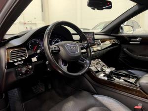 Grey Audi A8 2015 in Vilnius, with an engine capacity of 2.99 L and mileage of 221 thousand km for 21490 €, photo 9 on AUTOMOTO.COM.LV