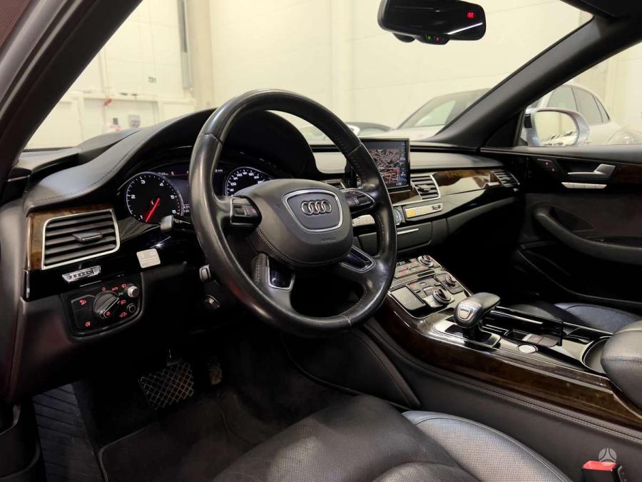 Grey Audi A8 2015 in Vilnius, with an engine capacity of 2.99 L and mileage of 221 thousand km for 21490 €, photo 9 on AUTOMOTO.COM.LV