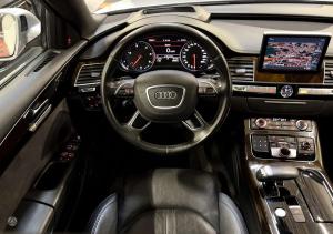 Grey Audi A8 2015 in Vilnius, with an engine capacity of 2.99 L and mileage of 221 thousand km for 21490 €, photo 18 on AUTOMOTO.COM.LV