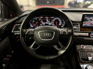 Grey Audi A8 2015 in Vilnius, with an engine capacity of 2.99 L and mileage of 221 thousand km for 21490 €, photo 19 on AUTOMOTO.COM.LV