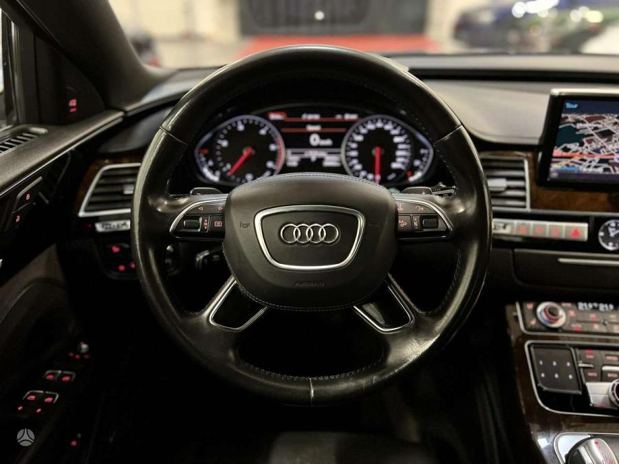 Grey Audi A8 2015 in Vilnius, with an engine capacity of 2.99 L and mileage of 221 thousand km for 21490 €, photo 19 on AUTOMOTO.COM.LV