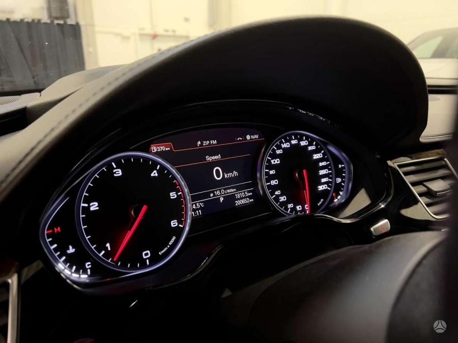 Grey Audi A8 2015 in Vilnius, with an engine capacity of 2.99 L and mileage of 221 thousand km for 21490 €, photo 20 on AUTOMOTO.COM.LV