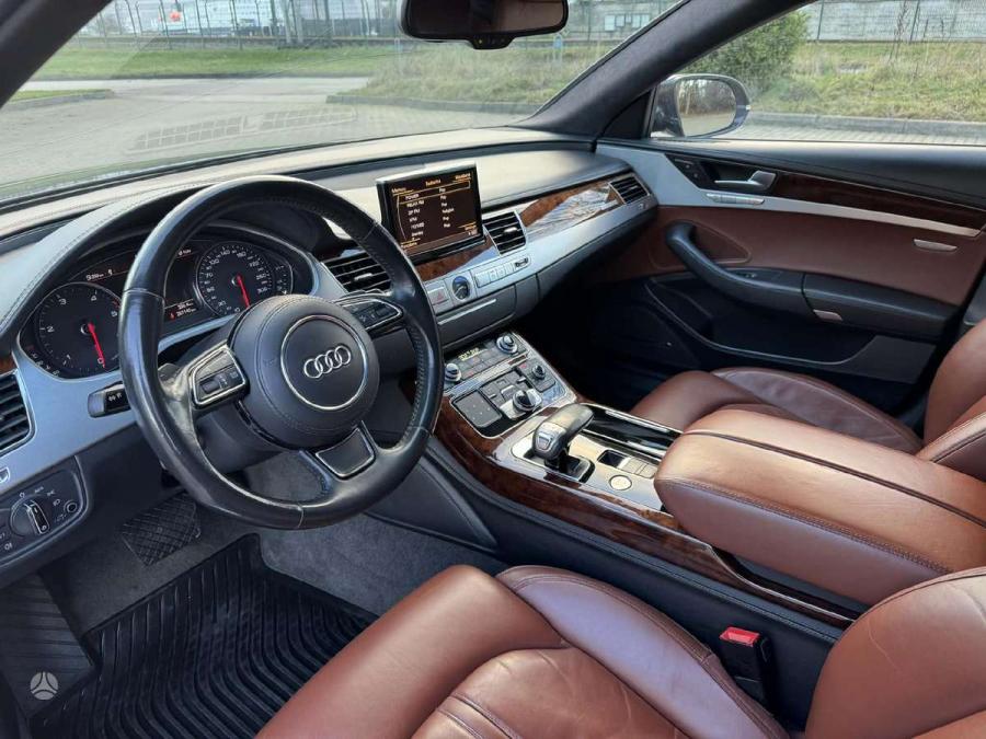 Grey Audi A8 2011 in Klaipeda, with an engine capacity of 4.13 L and mileage of 287 thousand km for 14700 €, photo 8 on AUTOMOTO.COM.LV