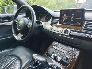 Grey Audi A8 2011 in Vilnius, with an engine capacity of 4.16 L and mileage of 305 thousand km for 7250 €, photo 13 on AUTOMOTO.COM.LV