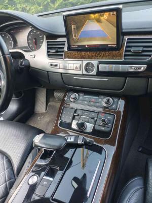Grey Audi A8 2011 in Vilnius, with an engine capacity of 4.16 L and mileage of 305 thousand km for 7250 €, photo 14 on AUTOMOTO.COM.LV