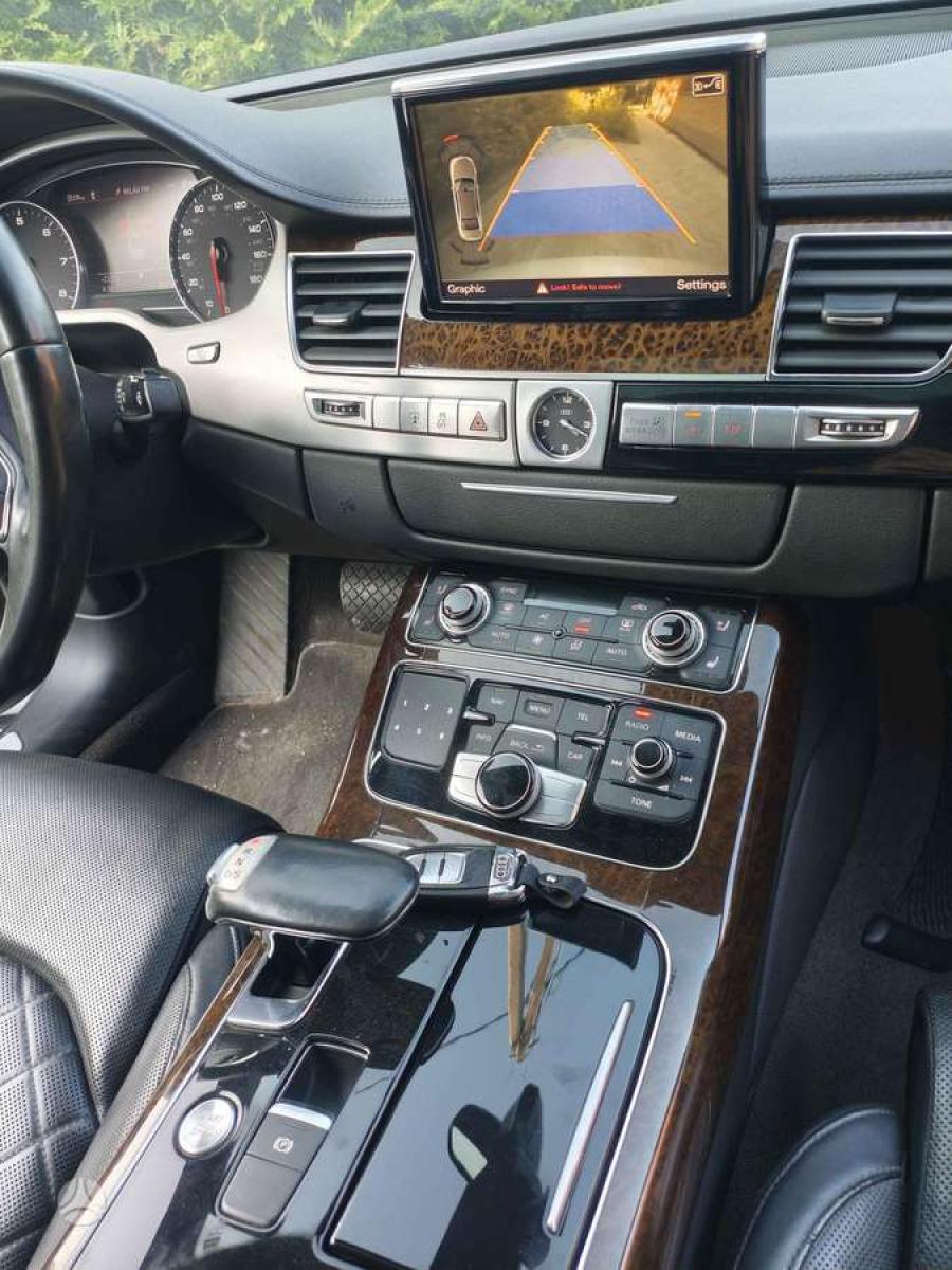 Grey Audi A8 2011 in Vilnius, with an engine capacity of 4.16 L and mileage of 305 thousand km for 7250 €, photo 14 on AUTOMOTO.COM.LV