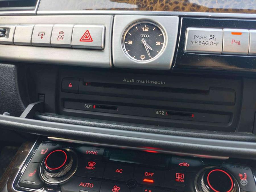 Grey Audi A8 2011 in Vilnius, with an engine capacity of 4.16 L and mileage of 305 thousand km for 7250 €, photo 15 on AUTOMOTO.COM.LV