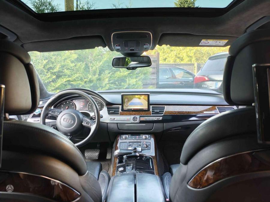 Grey Audi A8 2011 in Vilnius, with an engine capacity of 4.16 L and mileage of 305 thousand km for 7250 €, photo 23 on AUTOMOTO.COM.LV