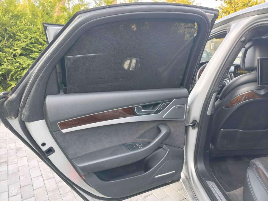 Grey Audi A8 2011 in Vilnius, with an engine capacity of 4.16 L and mileage of 305 thousand km for 7250 €, photo 24 on AUTOMOTO.COM.LV