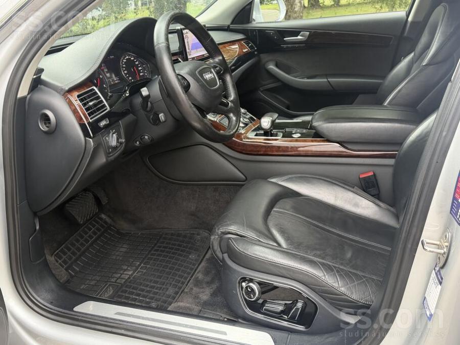 Grey Audi A8 2011 in Riga, with an engine capacity of 3.00 L and mileage of 299 thousand km for 11000 €, photo 8 on AUTOMOTO.COM.LV