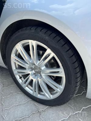 Grey Audi A8 2013 in Riga, with an engine capacity of 3.00 L and mileage of 310 thousand km for 11500 €, photo 12 on AUTOMOTO.COM.LV