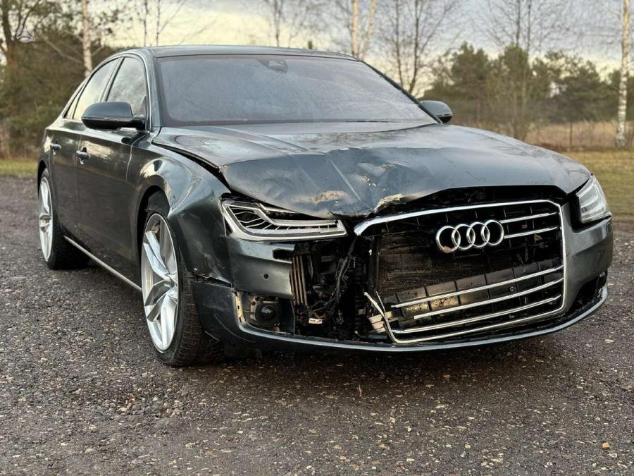 Grey Audi A8 2014 in Ukmerge, with an engine capacity of 4.13 L and mileage of 295 thousand km for 8300 €, photo 4 on AUTOMOTO.COM.LV