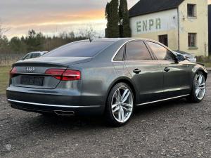 Grey Audi A8 2014 in Ukmerge, with an engine capacity of 4.13 L and mileage of 295 thousand km for 8300 €, photo 5 on AUTOMOTO.COM.LV
