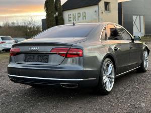 Grey Audi A8 2014 in Ukmerge, with an engine capacity of 4.13 L and mileage of 295 thousand km for 8300 €, photo 6 on AUTOMOTO.COM.LV