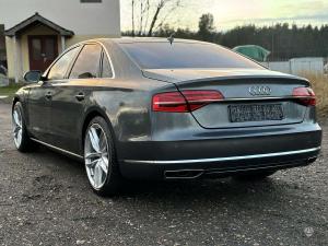 Grey Audi A8 2014 in Ukmerge, with an engine capacity of 4.13 L and mileage of 295 thousand km for 8300 €, photo 8 on AUTOMOTO.COM.LV