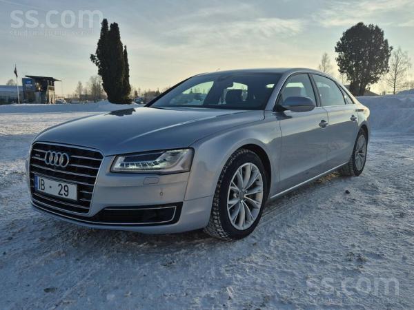 Grey Audi A8 2014 in Riga, with an engine capacity of 4.20 L and mileage of 264 thousand km for 24000 €, photo 1 on AUTOMOTO.COM.LV