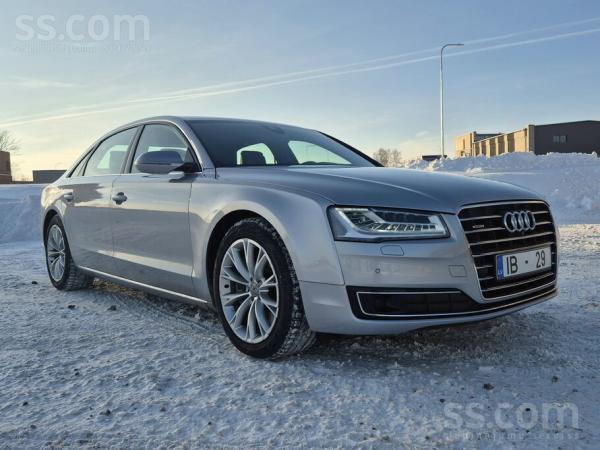 Grey Audi A8 2014 in Riga, with an engine capacity of 4.20 L and mileage of 264 thousand km for 24000 €, photo 2 on AUTOMOTO.COM.LV