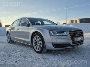 Grey Audi A8 2014 in Riga, with an engine capacity of 4.20 L and mileage of 264 thousand km for 24000 €, photo 2 on AUTOMOTO.COM.LV