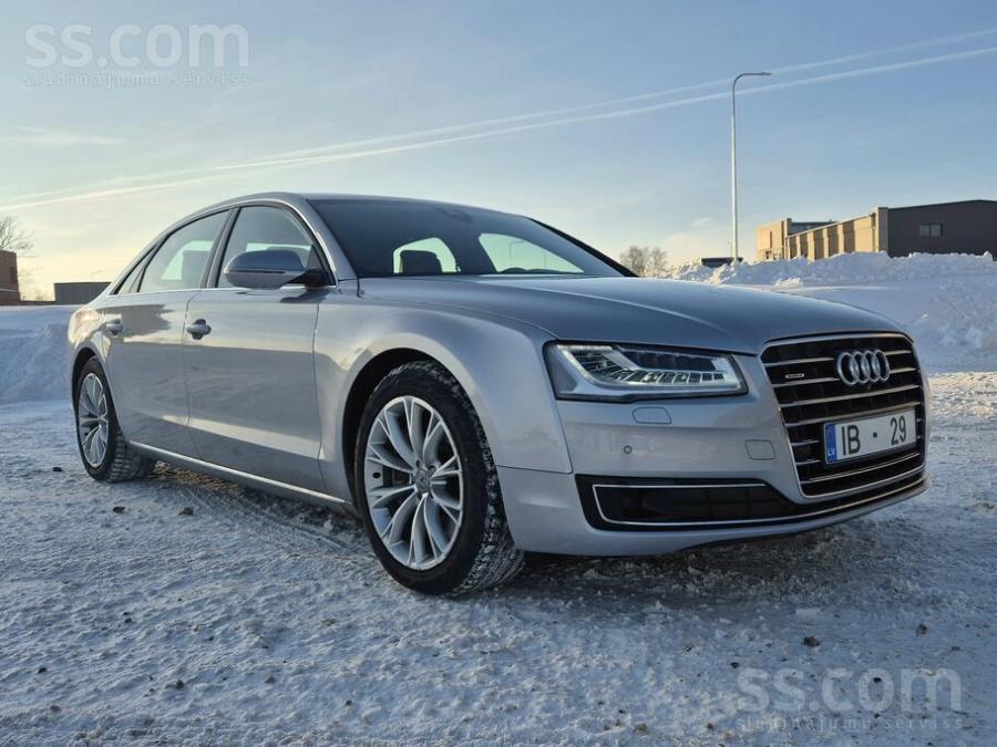Grey Audi A8 2014 in Riga, with an engine capacity of 4.20 L and mileage of 264 thousand km for 24000 €, photo 2 on AUTOMOTO.COM.LV
