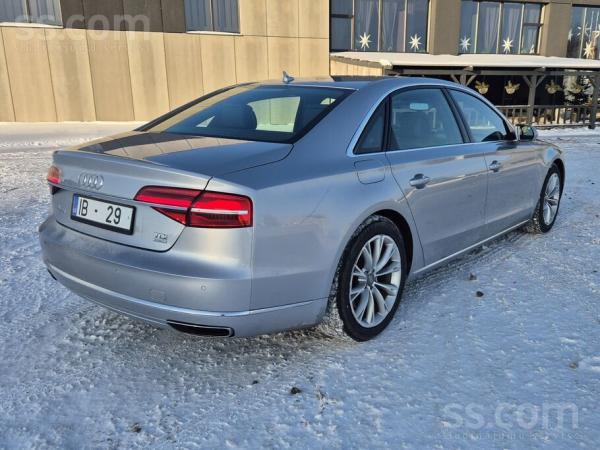 Grey Audi A8 2014 in Riga, with an engine capacity of 4.20 L and mileage of 264 thousand km for 24000 €, photo 3 on AUTOMOTO.COM.LV