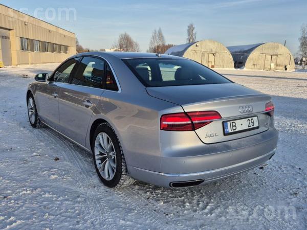 Grey Audi A8 2014 in Riga, with an engine capacity of 4.20 L and mileage of 264 thousand km for 24000 €, photo 4 on AUTOMOTO.COM.LV