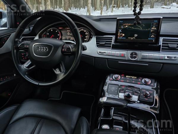 Grey Audi A8 2014 in Riga, with an engine capacity of 4.20 L and mileage of 264 thousand km for 24000 €, photo 9 on AUTOMOTO.COM.LV