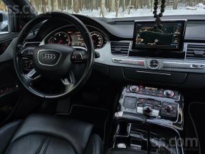 Grey Audi A8 2014 in Riga, with an engine capacity of 4.20 L and mileage of 264 thousand km for 24000 €, photo 9 on AUTOMOTO.COM.LV