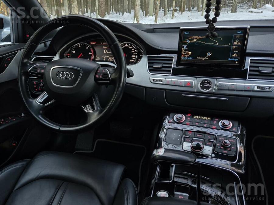 Grey Audi A8 2014 in Riga, with an engine capacity of 4.20 L and mileage of 264 thousand km for 24000 €, photo 9 on AUTOMOTO.COM.LV