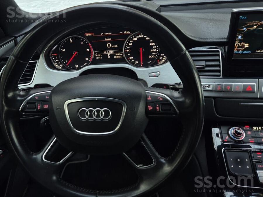 Grey Audi A8 2014 in Riga, with an engine capacity of 4.20 L and mileage of 264 thousand km for 24000 €, photo 11 on AUTOMOTO.COM.LV