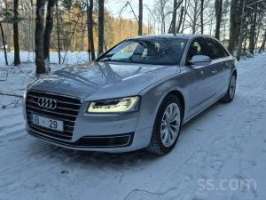 Grey Audi A8 2014 in Riga, with an engine capacity of 4.20 L and mileage of 264 thousand km for 24000 €, photo 15 on AUTOMOTO.COM.LV