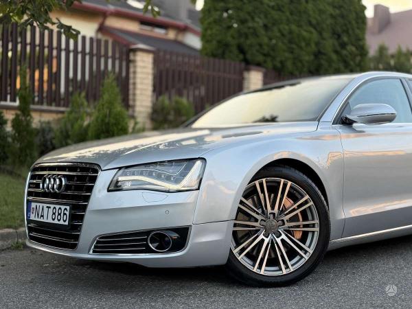 Grey Audi A8 2014 in Vilnius, with an engine capacity of 4.13 L and mileage of 280 thousand km for 11950 €, photo 5 on AUTOMOTO.COM.LV