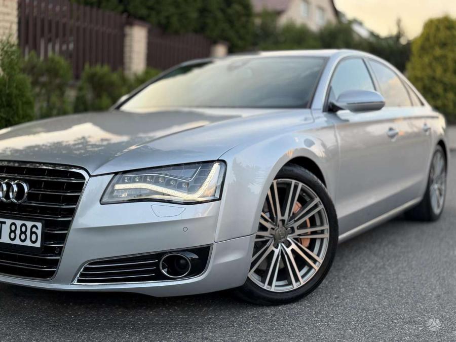 Grey Audi A8 2014 in Vilnius, with an engine capacity of 4.13 L and mileage of 280 thousand km for 11950 €, photo 7 on AUTOMOTO.COM.LV