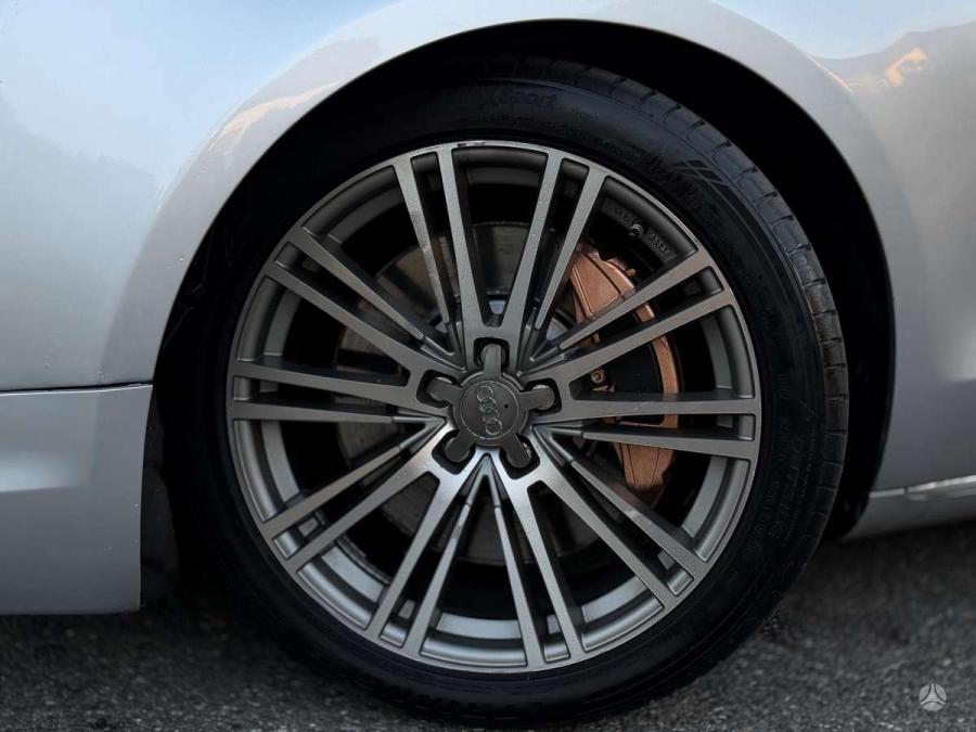 Grey Audi A8 2014 in Vilnius, with an engine capacity of 4.13 L and mileage of 280 thousand km for 11950 €, photo 9 on AUTOMOTO.COM.LV